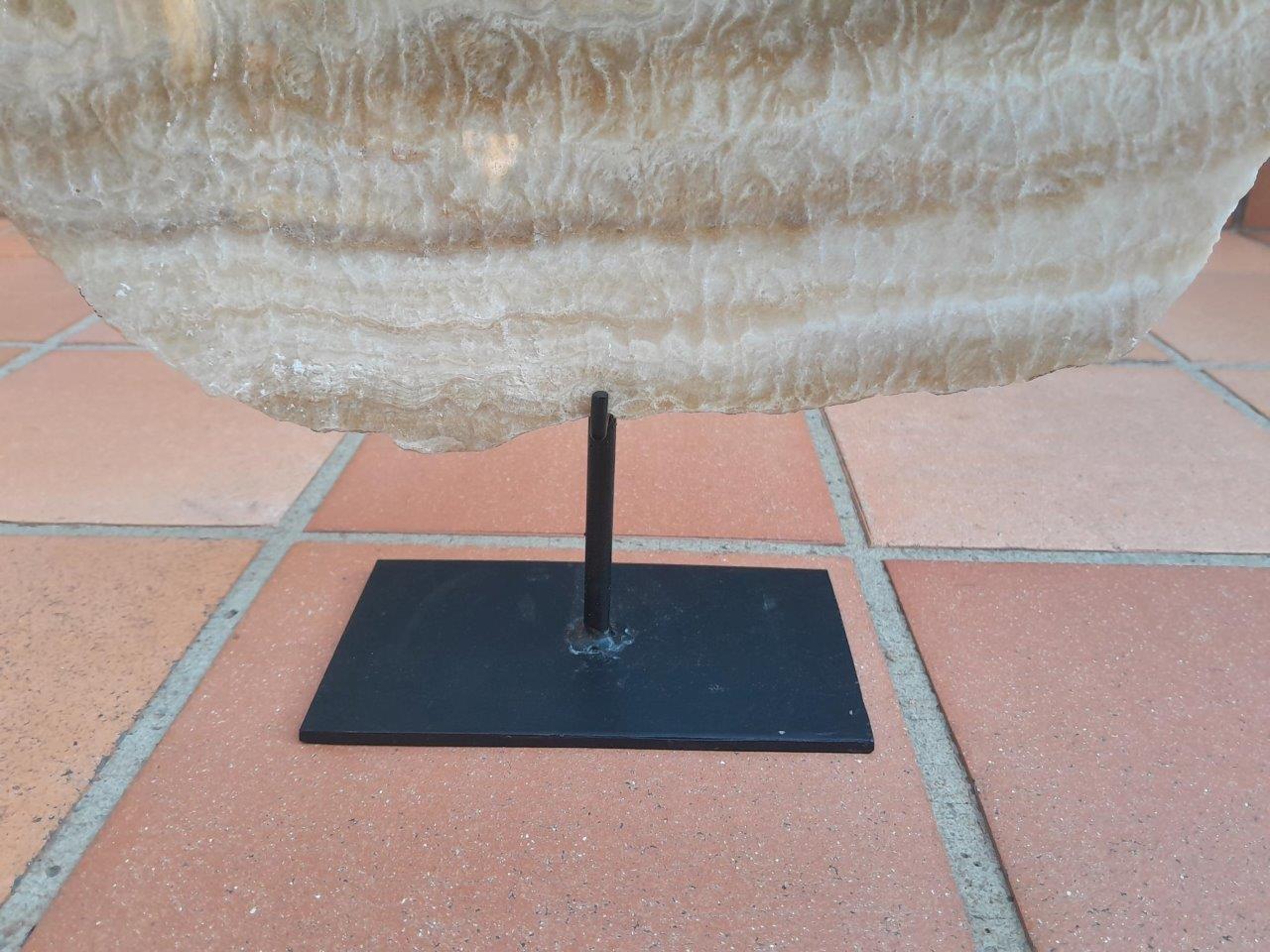 A Cross Section Of Marble On Stand - The Crown Collection